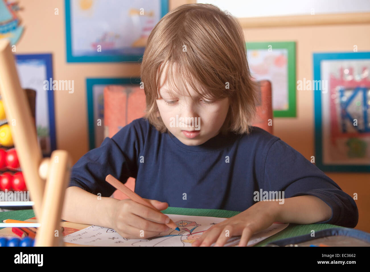 Boy Working on his Homework at Home Stock Photo - Alamy
