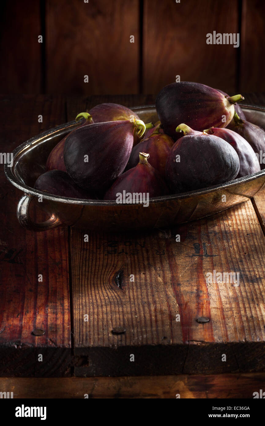 close up view of fresh figs on color back Stock Photo - Alamy
