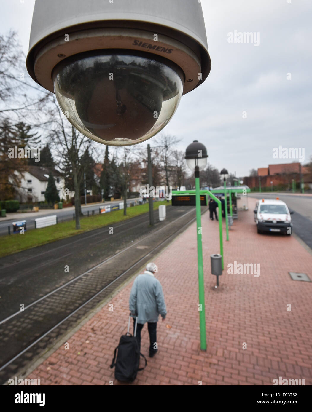 Sarstedt, Germany. 09th Dec, 2014. A man walks along the platform of a ...