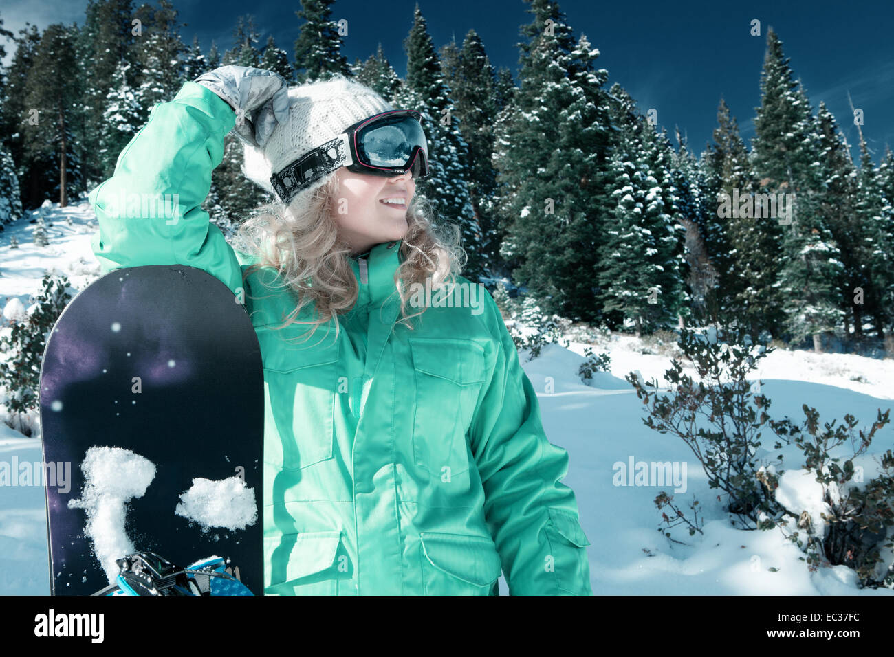 view of a young girl snowboarding in winter environment Stock Photo - Alamy