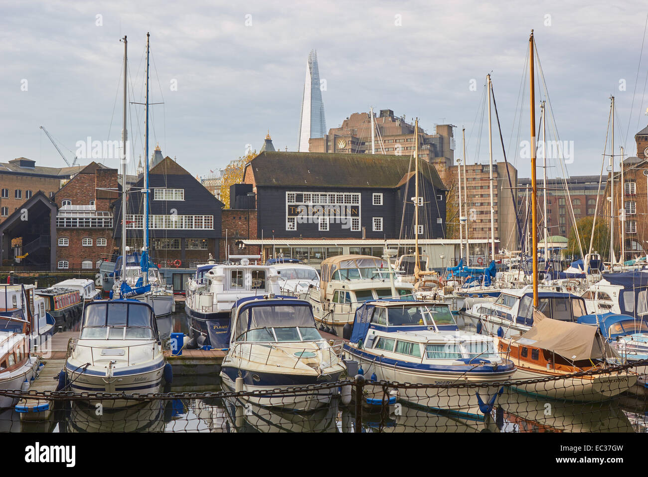 St Katherine Docks marina with the Dickens Inn east London England ...
