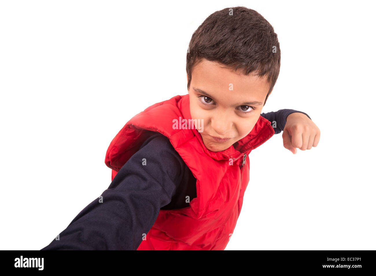 Young boy in fighting spirit isolated in white Stock Photo - Alamy