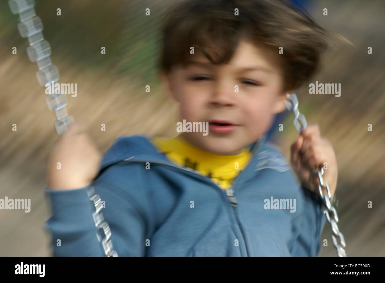 Children playing swing blur hi-res stock photography and images - Alamy