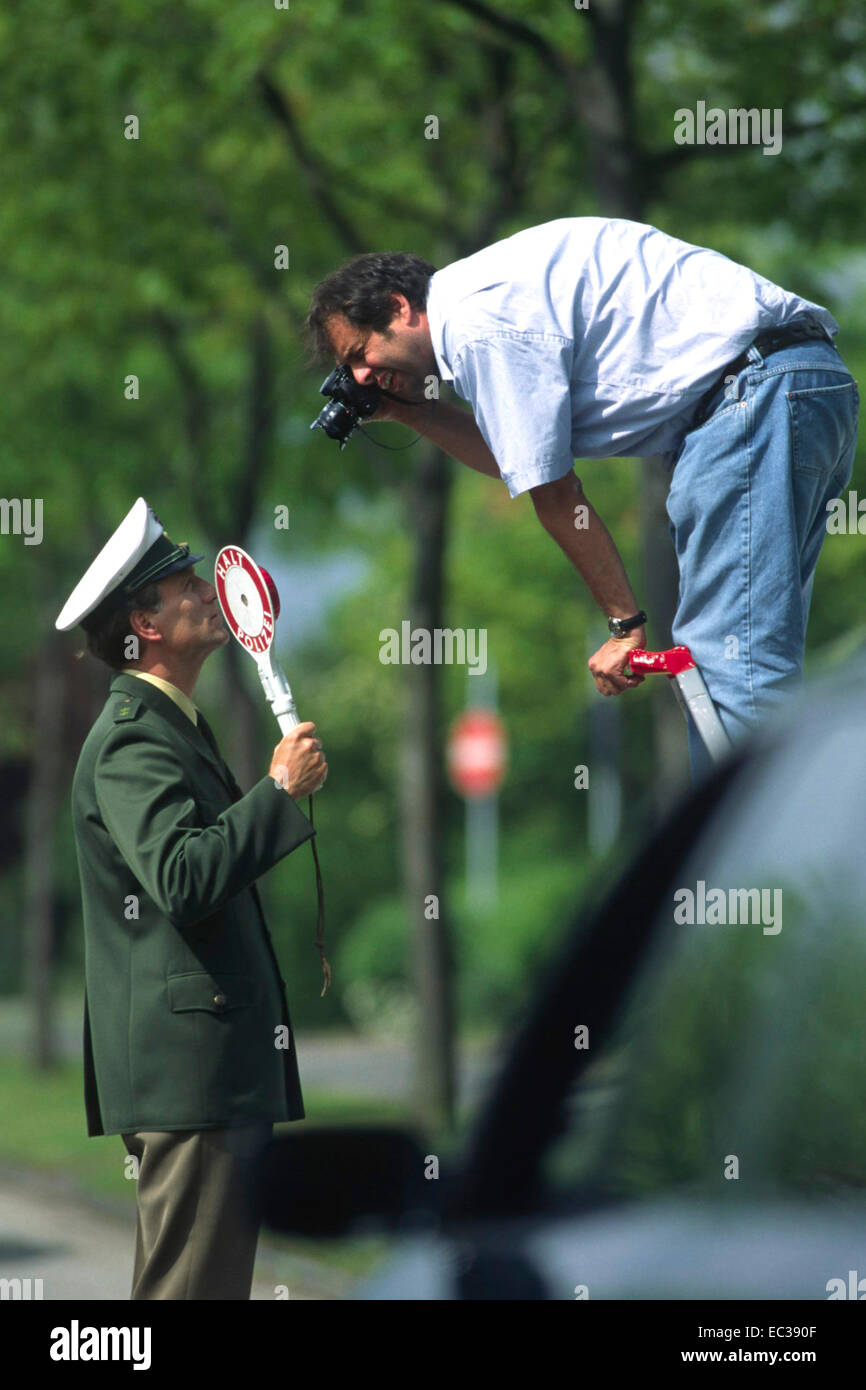 Police Officer is being photographed Stock Photo - Alamy