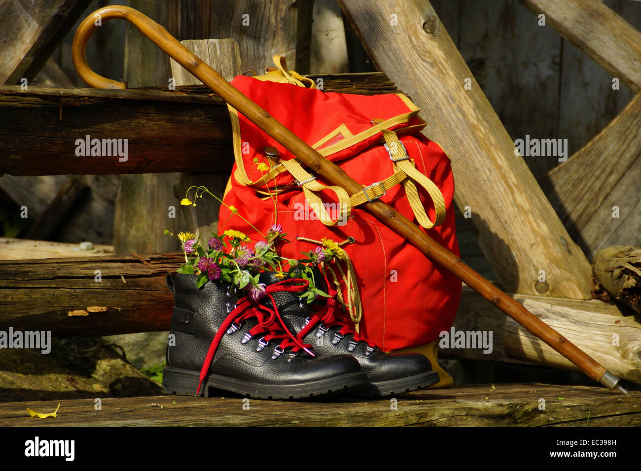 Backpack and hikingboots Stock Photo - Alamy