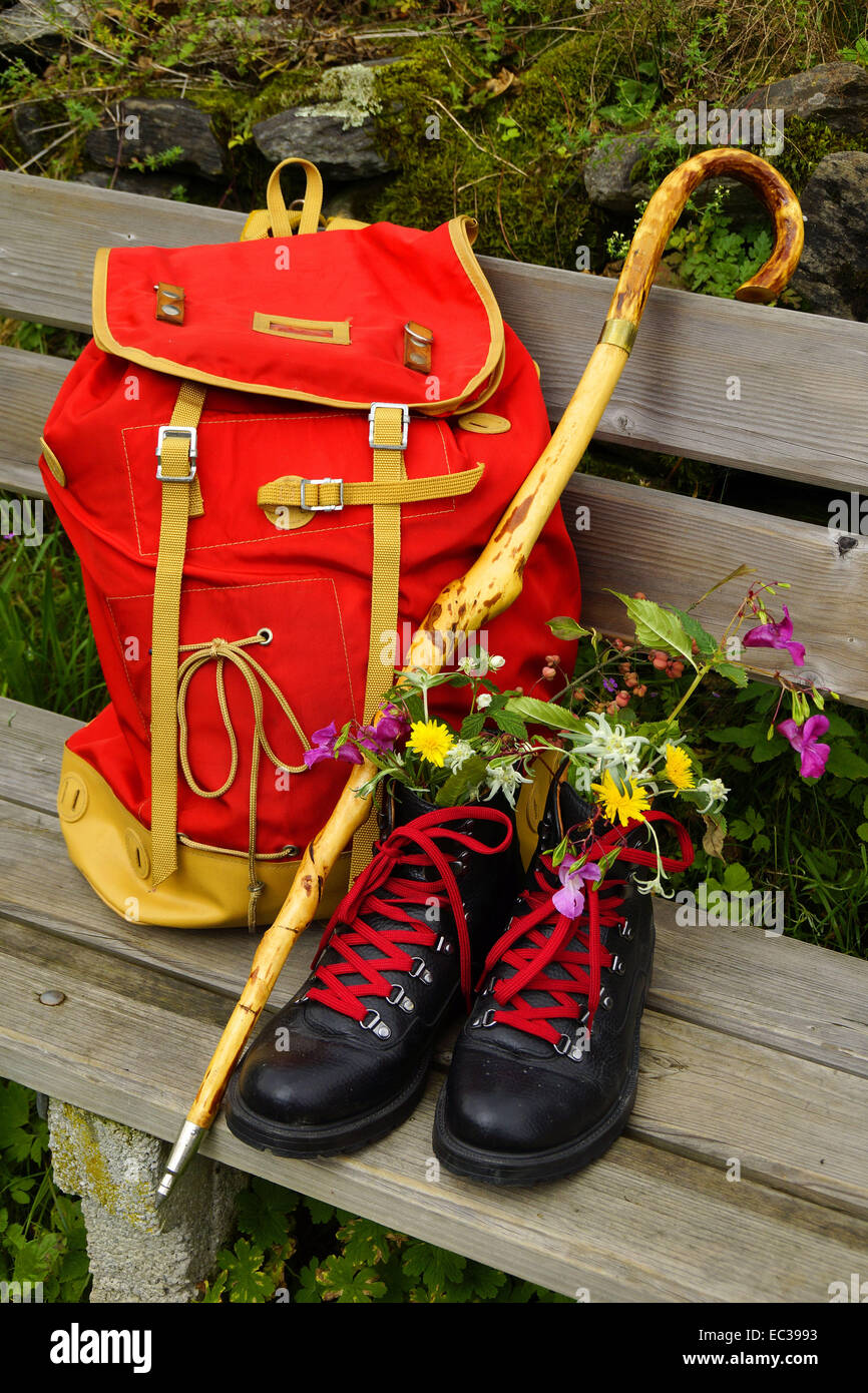 Backpack and hikingboots Stock Photo - Alamy