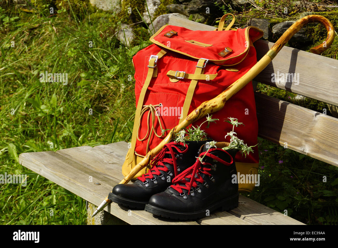 Backpack and hikingboots Stock Photo - Alamy