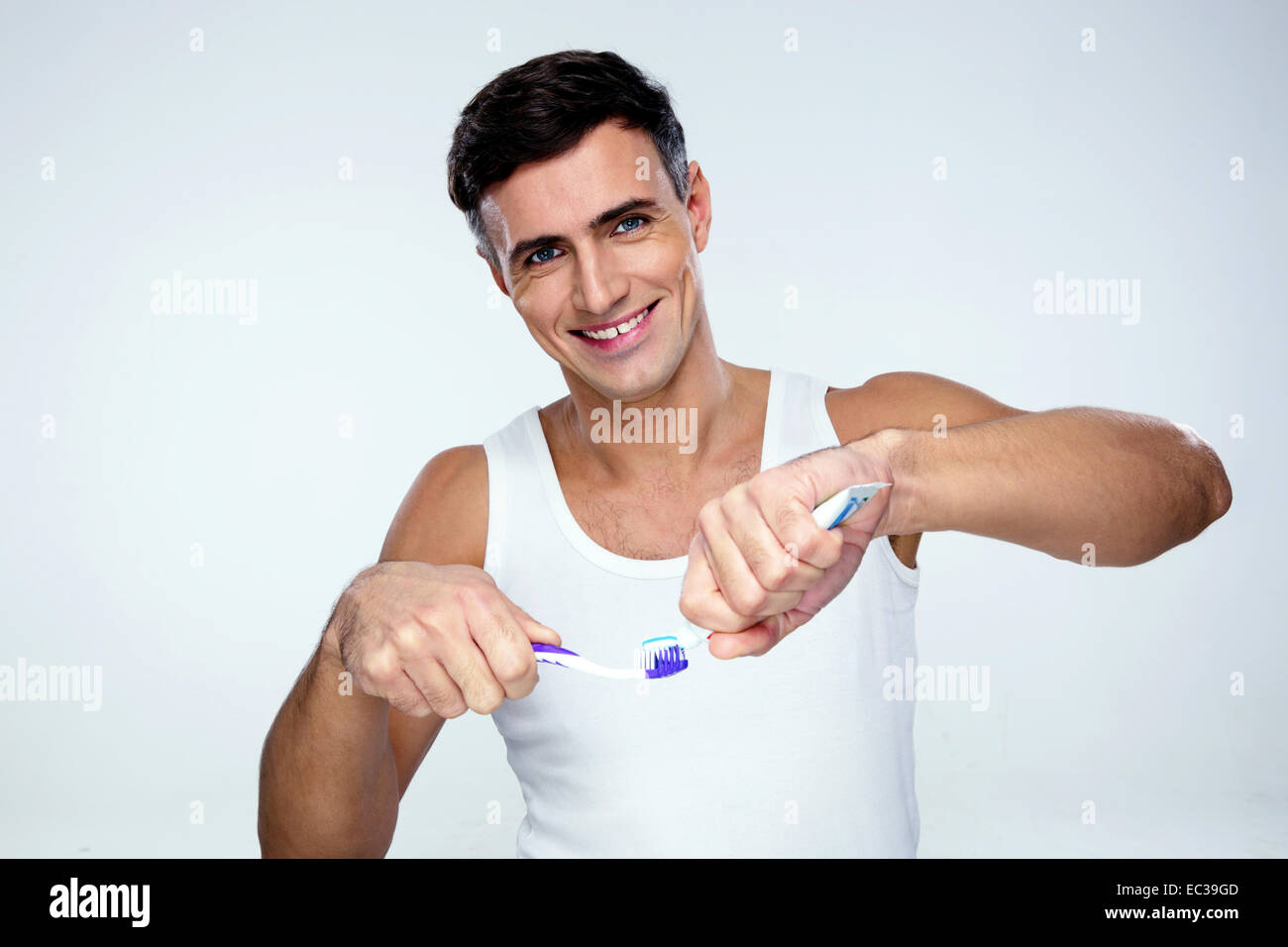 Squeezing toothpaste hi-res stock photography and images - Alamy