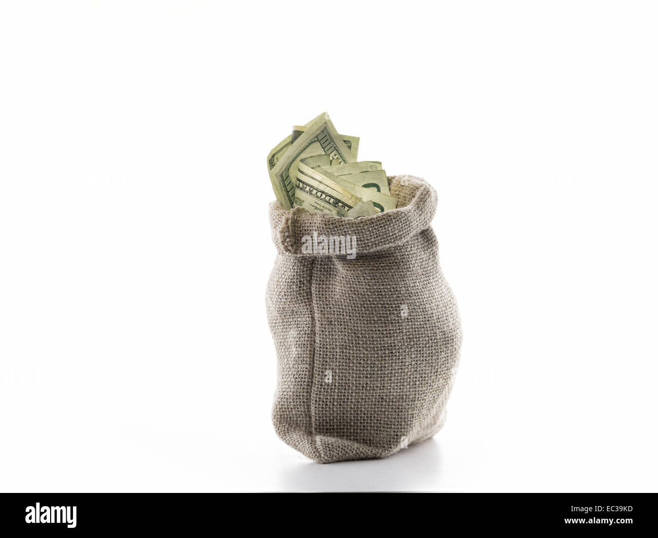 close up view of a bag full of cash money dollars bills in amount Stock ...