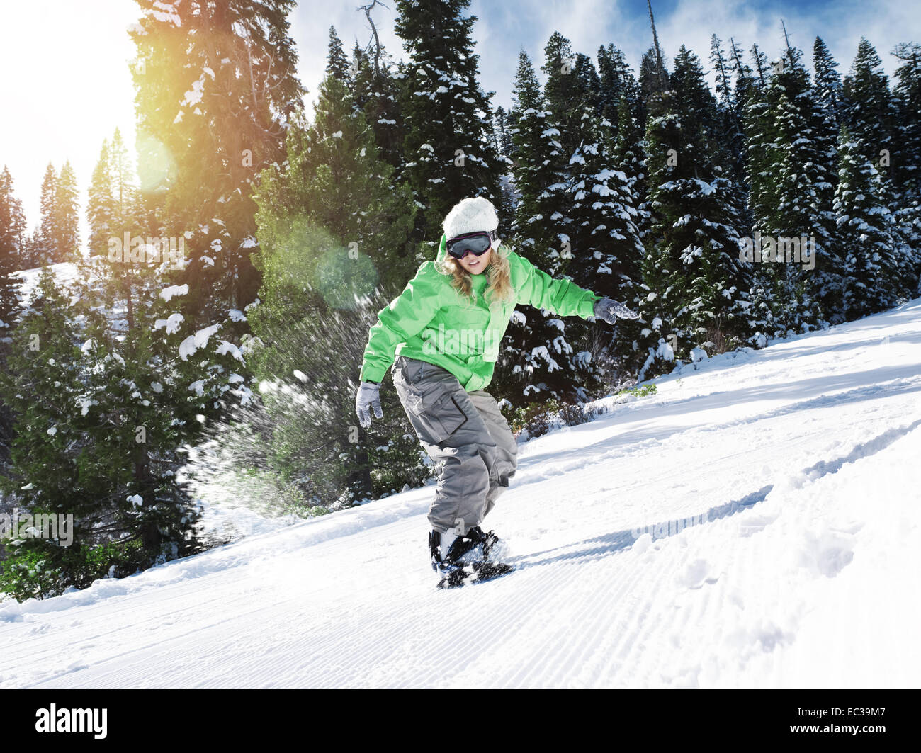 view of a young girl snowboarding in winter environment Stock Photo - Alamy