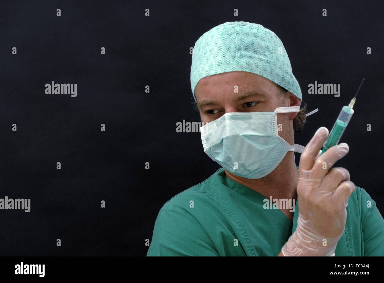 Doctor with Injection Stock Photo - Alamy
