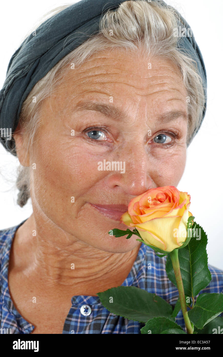 Older Woman with Rose Stock Photo - Alamy