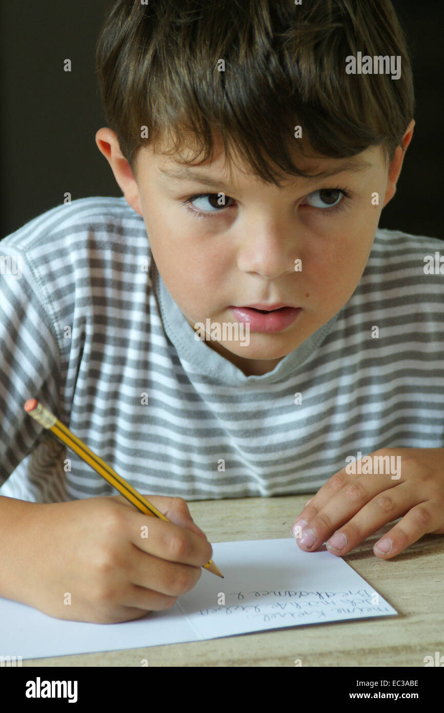 little boy does homework Stock Photo - Alamy little boy does homework Stock Photo - Alamy