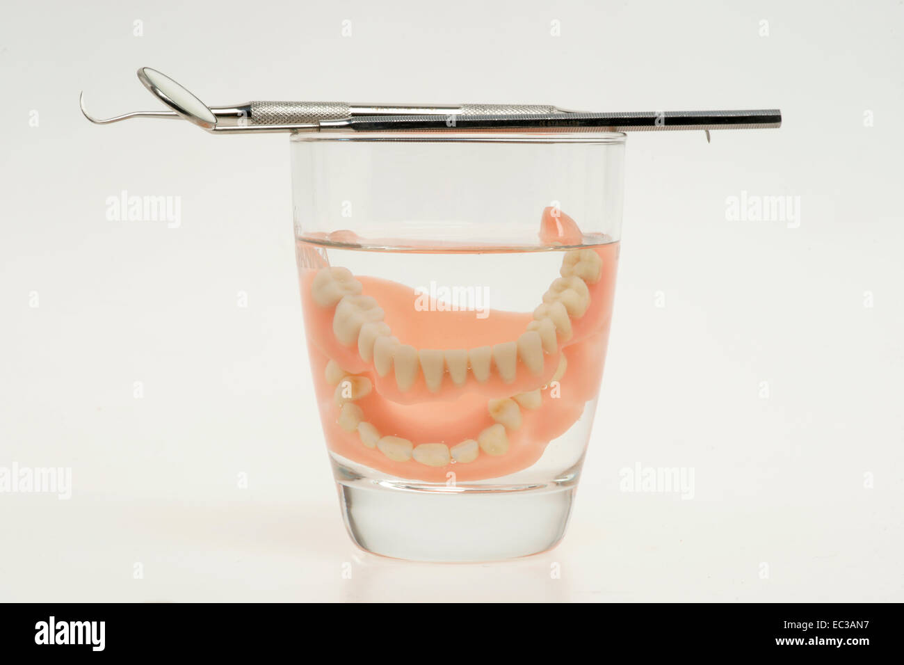 dentures with instruments Stock Photo - Alamy