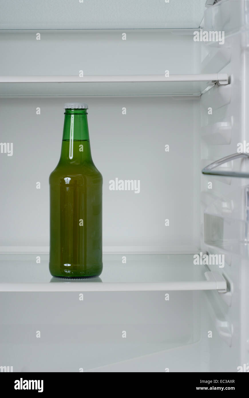 Bottle of Beer in Fridge Stock Photo - Alamy