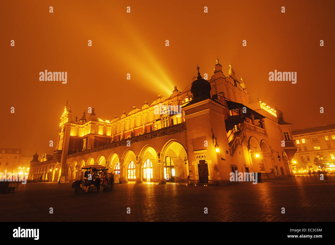 Market hall at main Cracow square at misty night with golden sky Stock ...