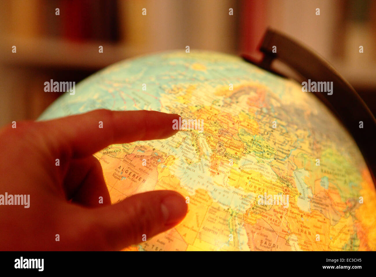 Finger pointing to Europe Stock Photo - Alamy