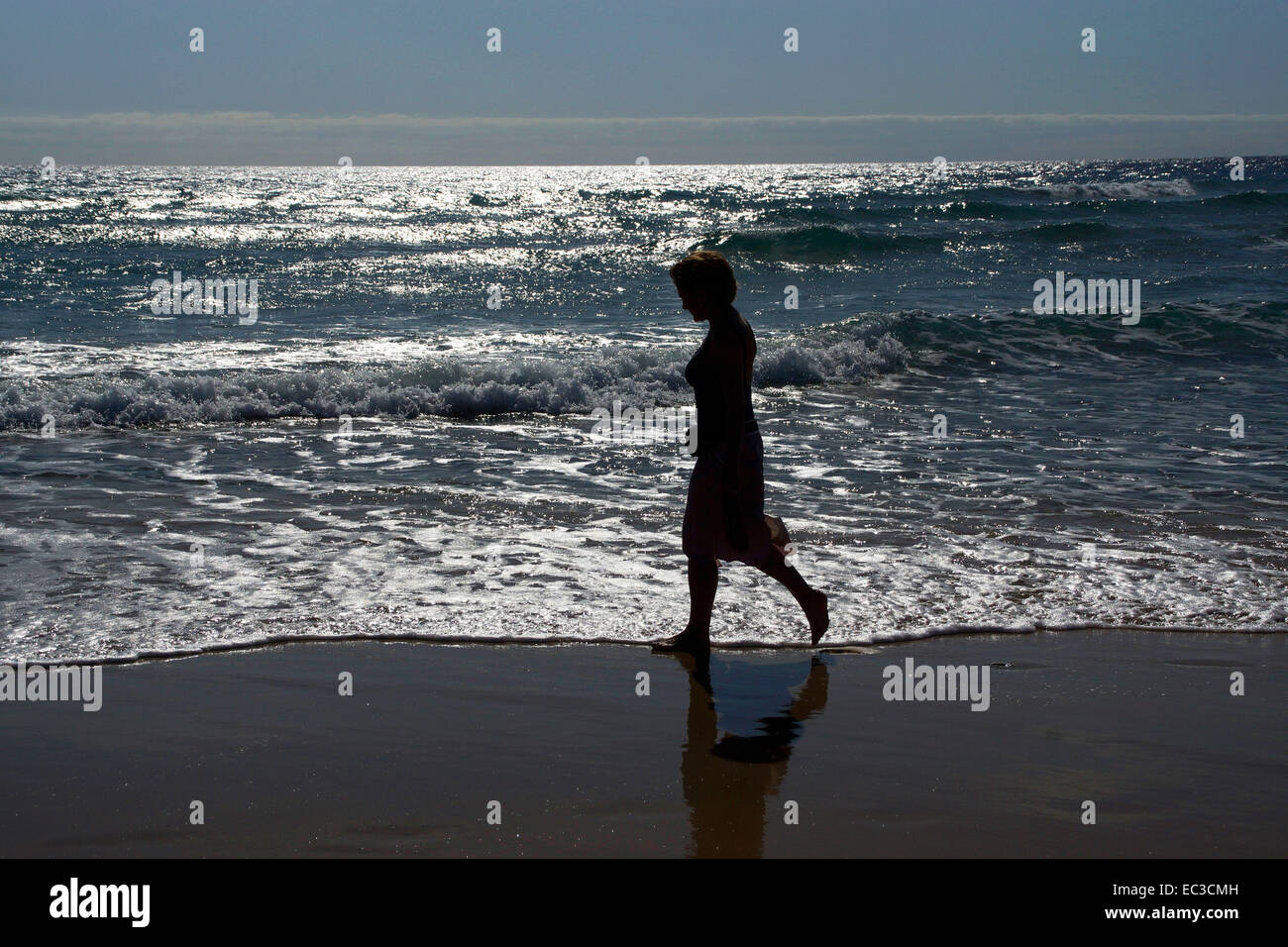 Woman walk at the beach Stock Photo - Alamy