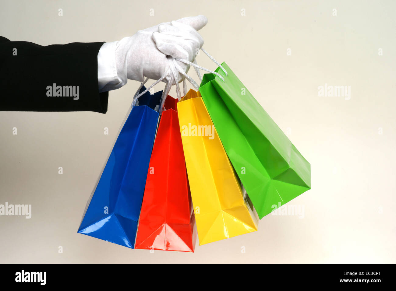 Butler with bags Stock Photo - Alamy