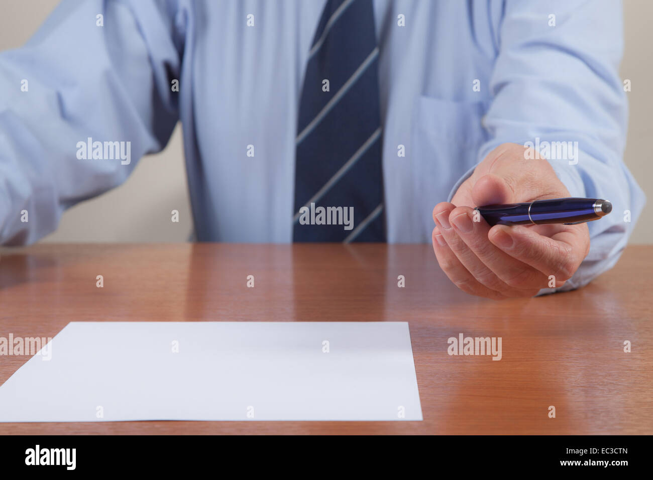 Men with pen and white sheet Stock Photo - Alamy