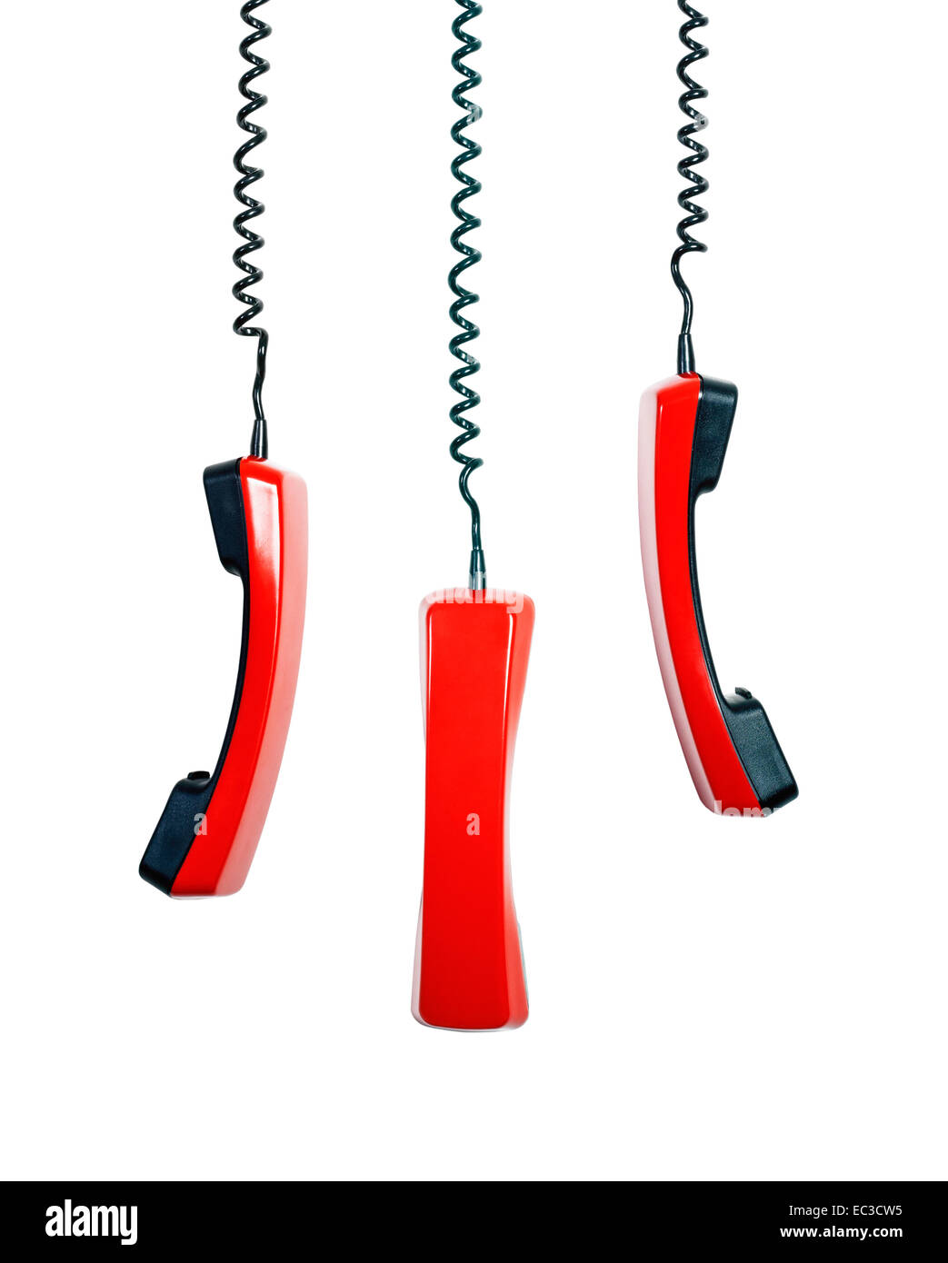 Vintage red phone receivers collection on white background ...