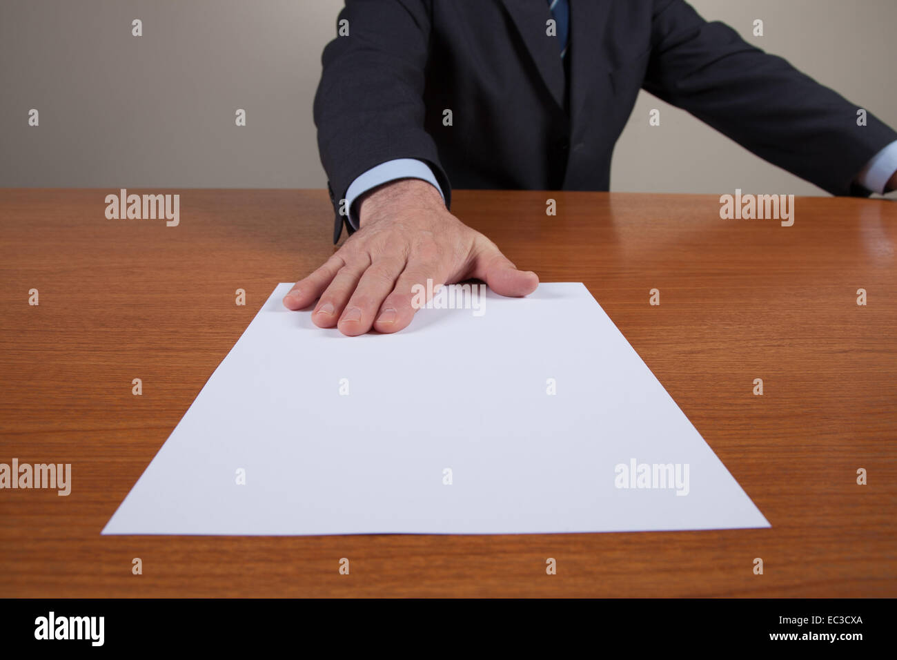 Men with one white sheet on the table Stock Photo - Alamy