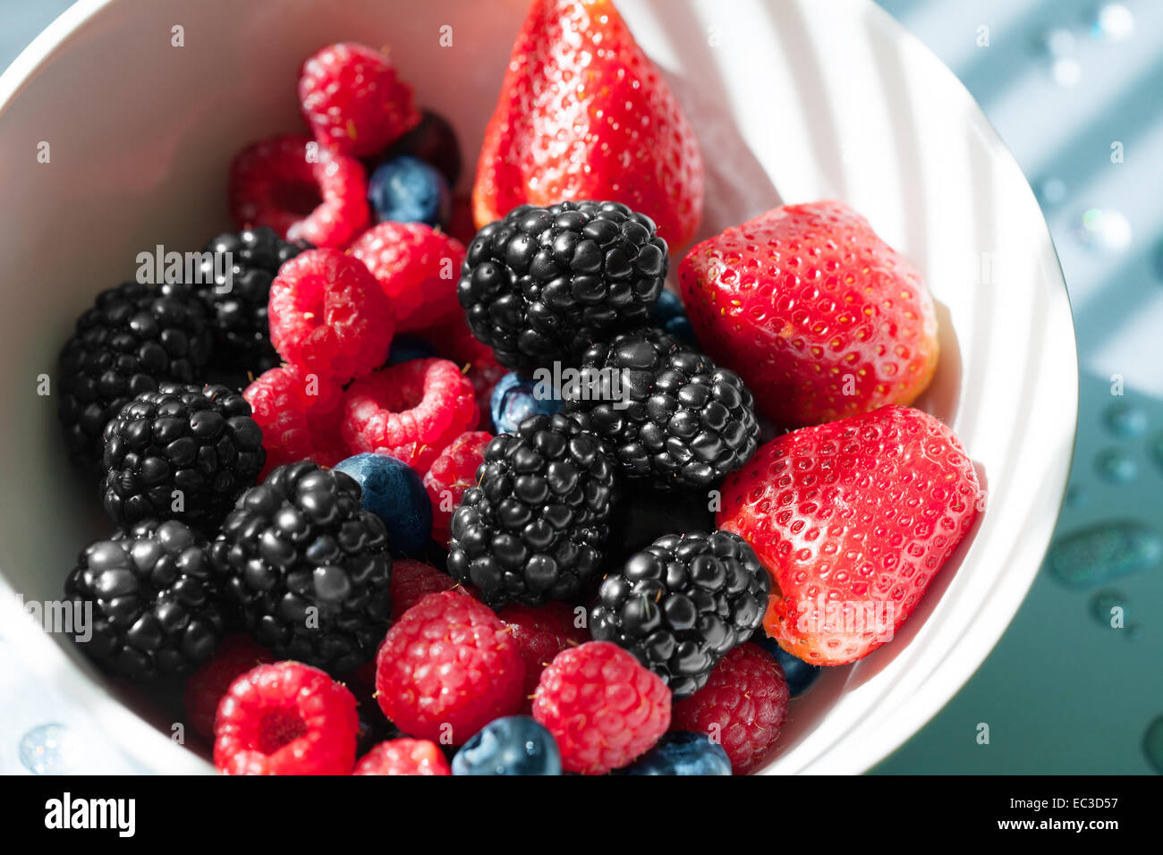 close up view of nice fresh berries on color background Stock Photo - Alamy