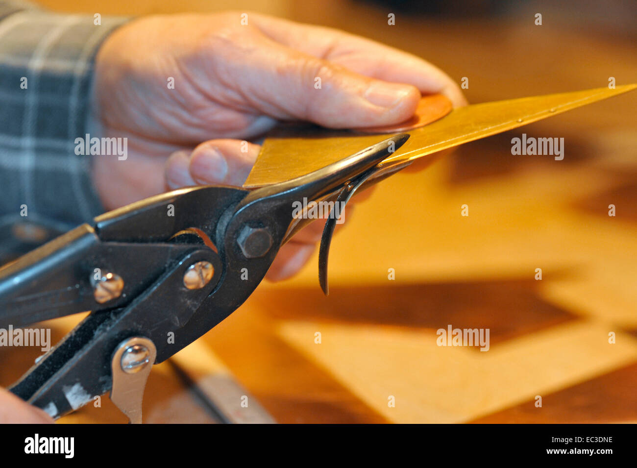 Retiree Working at Home with Metal Shears Stock Photo - Alamy
