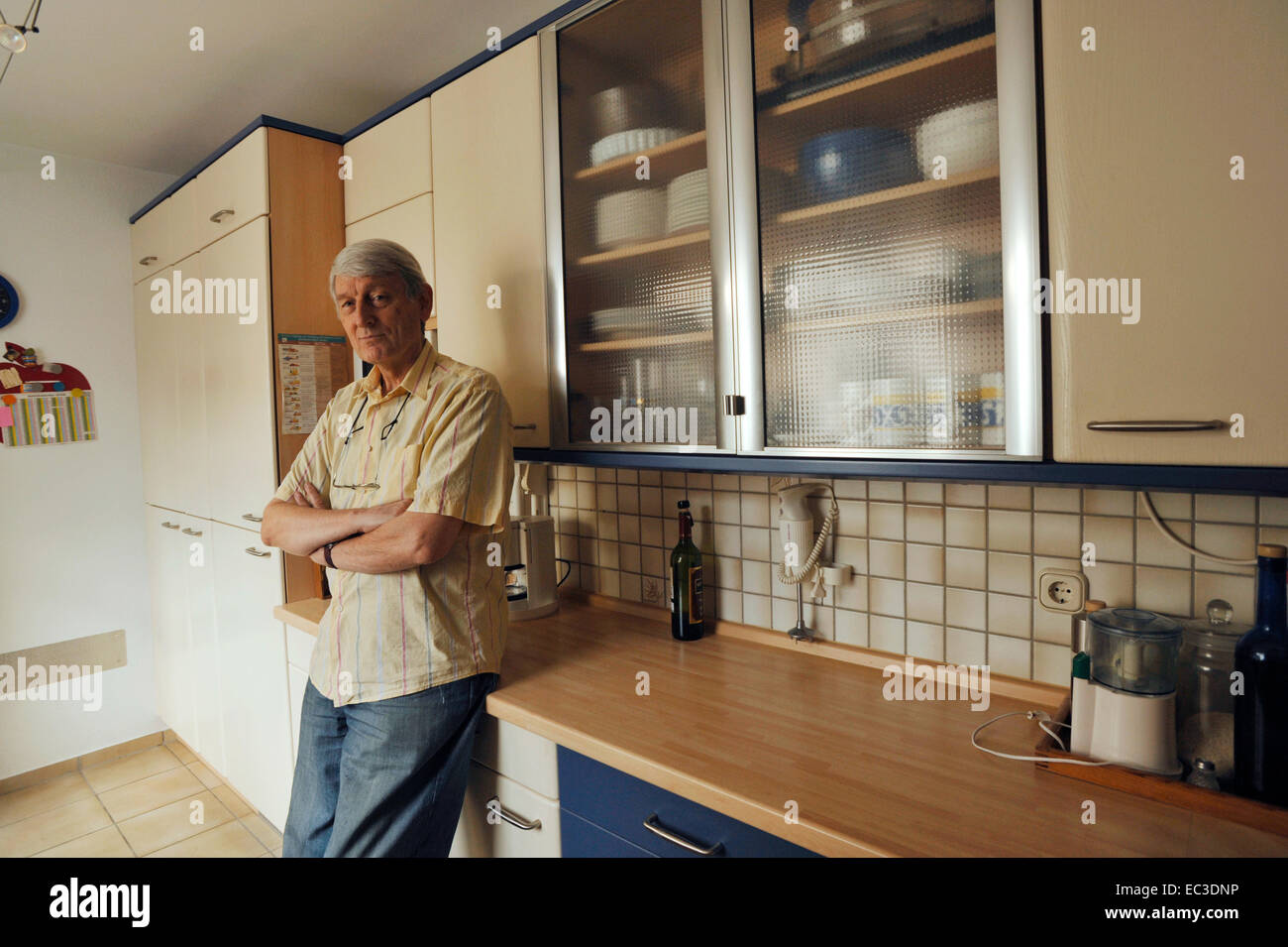 Retiree in the Kitchen Stock Photo - Alamy