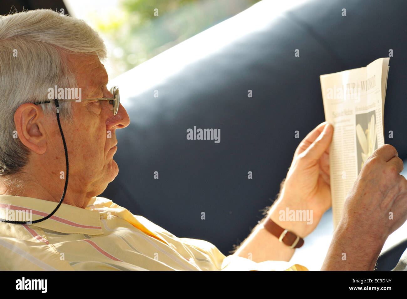 Old Man Reading Newspaper Stock Photo - Alamy