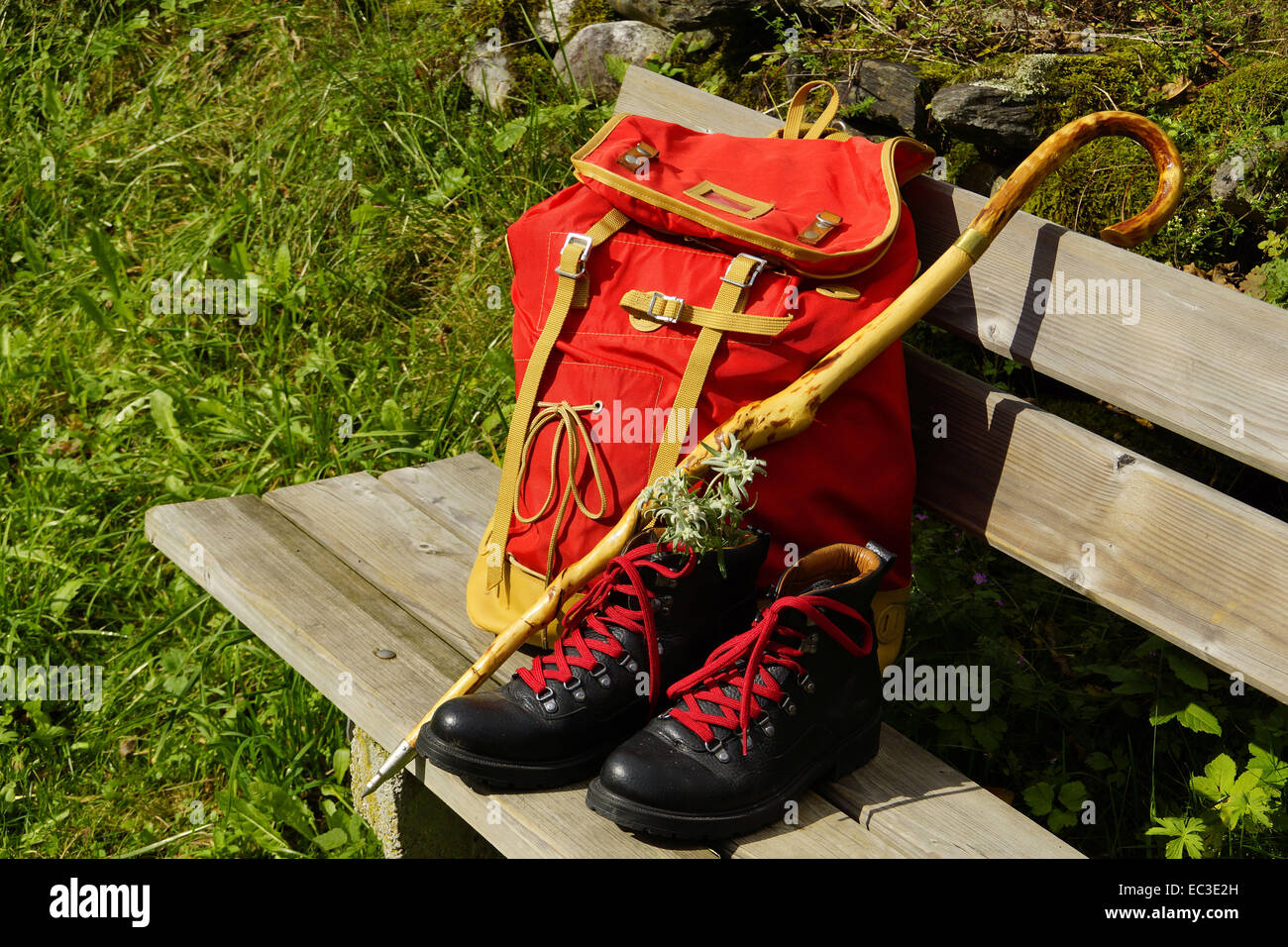 Backpack and hikingboots Stock Photo - Alamy