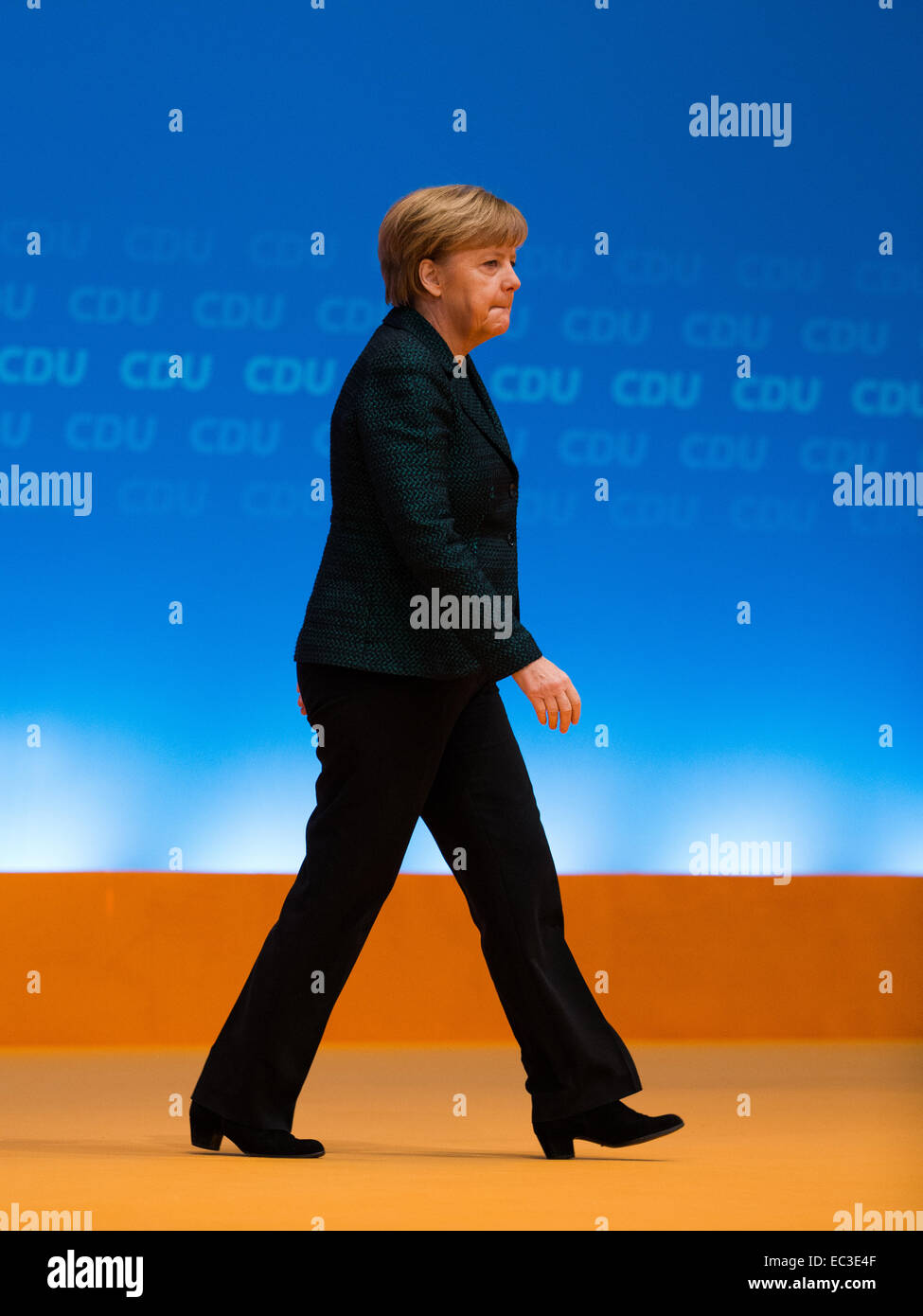 CDU chairwoman and German chancellor Angela Merkel walks on stage ...