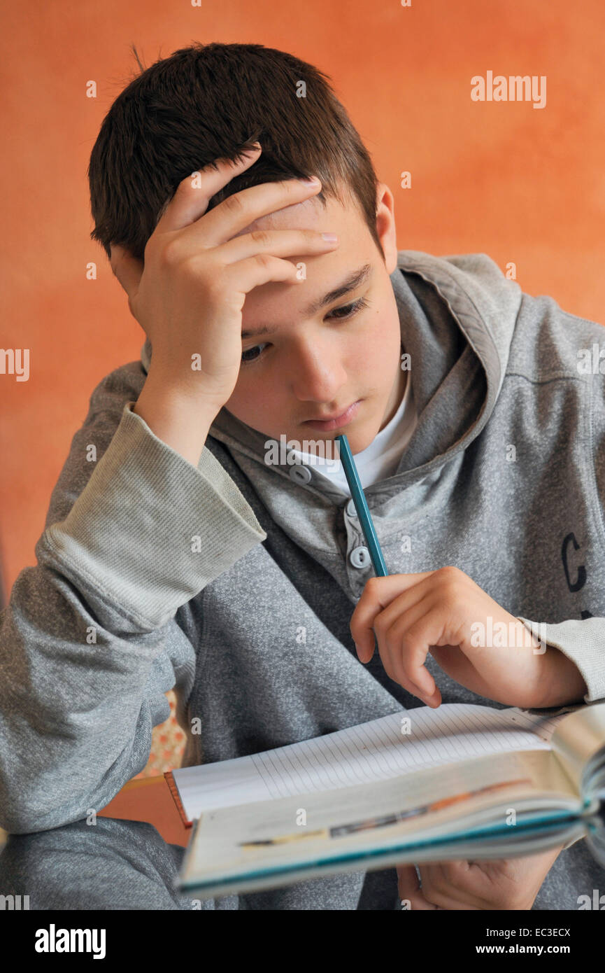 Teenager doing Homework Stock Photo - Alamy