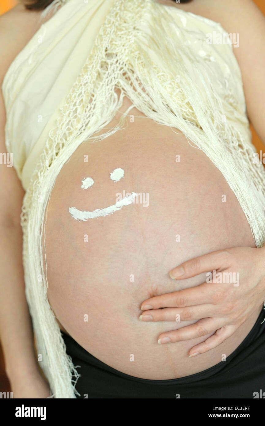 Belly with a smiley hi-res stock photography and images - Alamy
