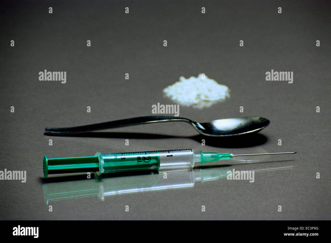 Syringe with a Spoon and white Powder Stock Photo - Alamy