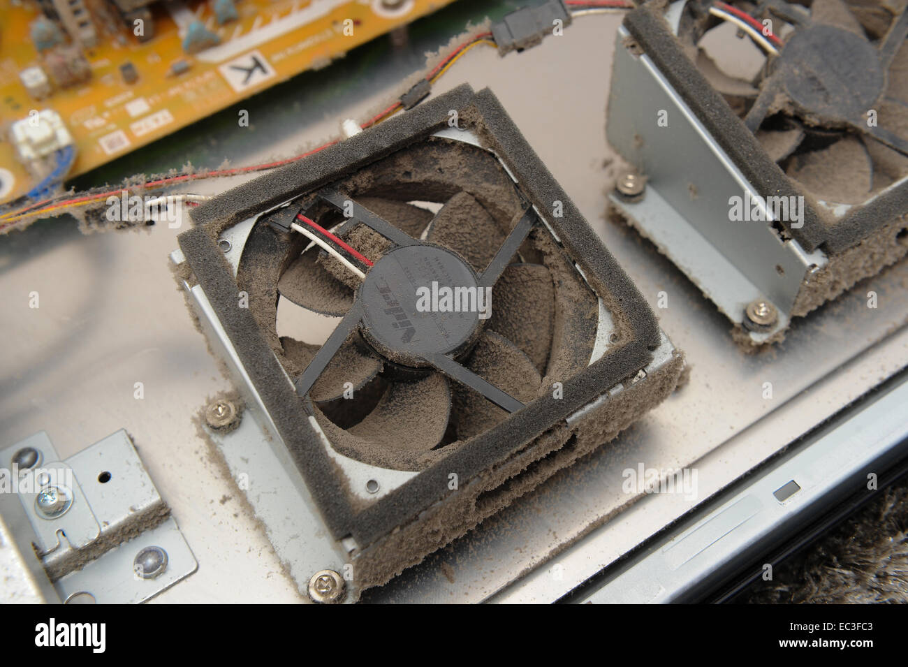Dust accumulation inside electronic equipment showing cooling fan ...
