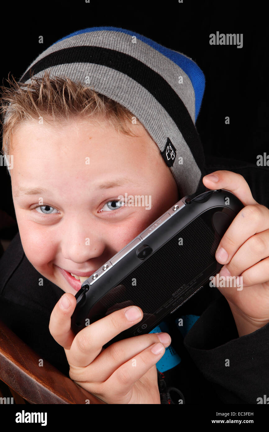 Young boy with playstation Stock Photo - Alamy