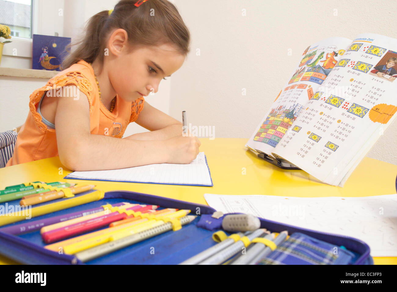 Child making Homework Stock Photo - Alamy