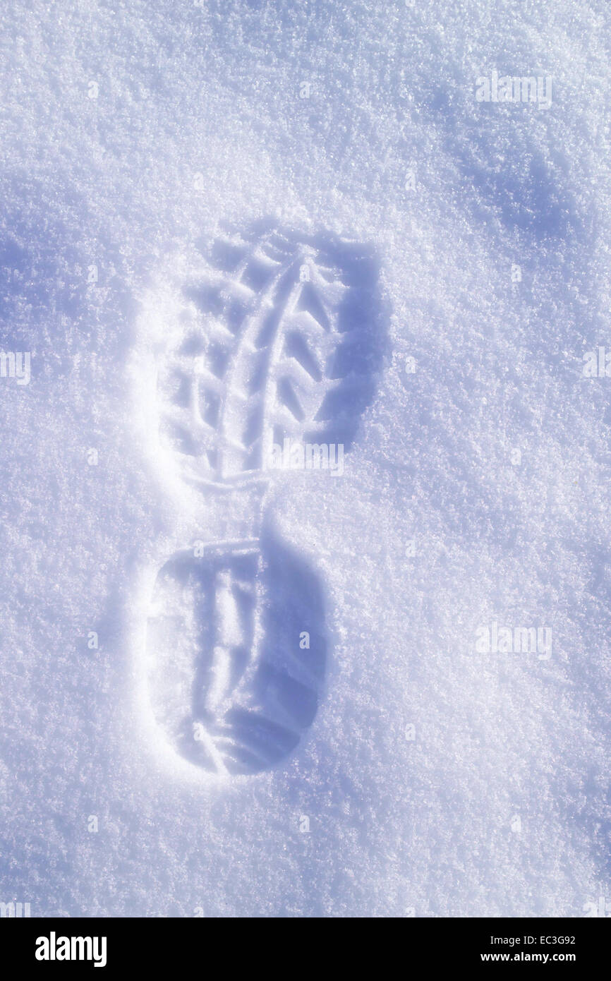 Footprint in Snow Stock Photo - Alamy