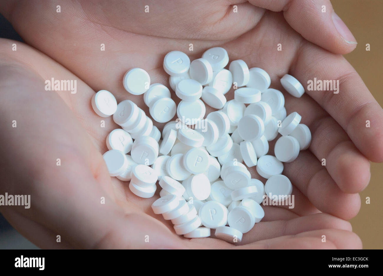 Hands with Medicine Stock Photo - Alamy