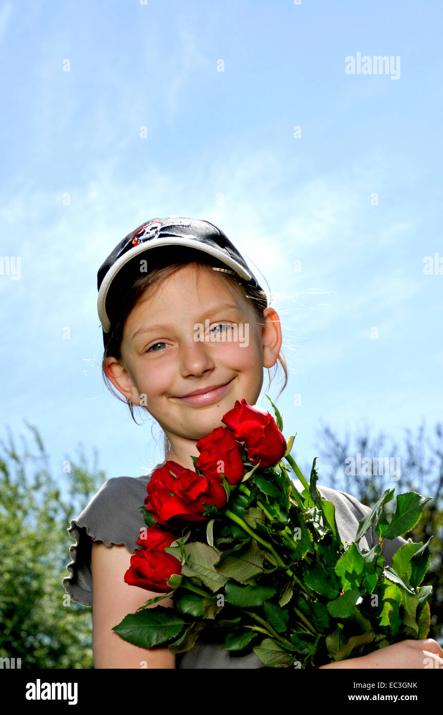 Girl with Roses Stock Photo - Alamy