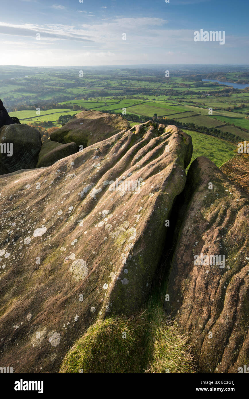 Weathered gritstone rocks on the summit of Hen Cloud (The Roaches) with ...