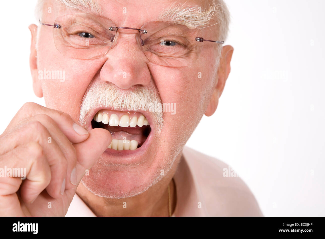 Old Man Putting in his Dentures Stock Photo - Alamy Old Man Putting in his Dentures Stock Photo - Alamy
