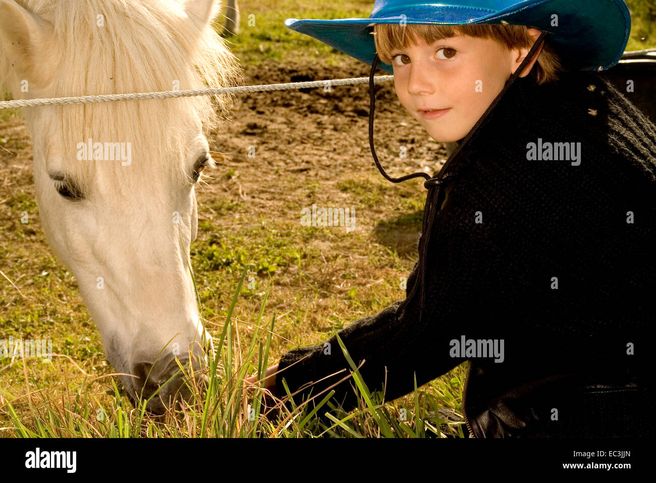 Child with Pony Stock Photo - Alamy