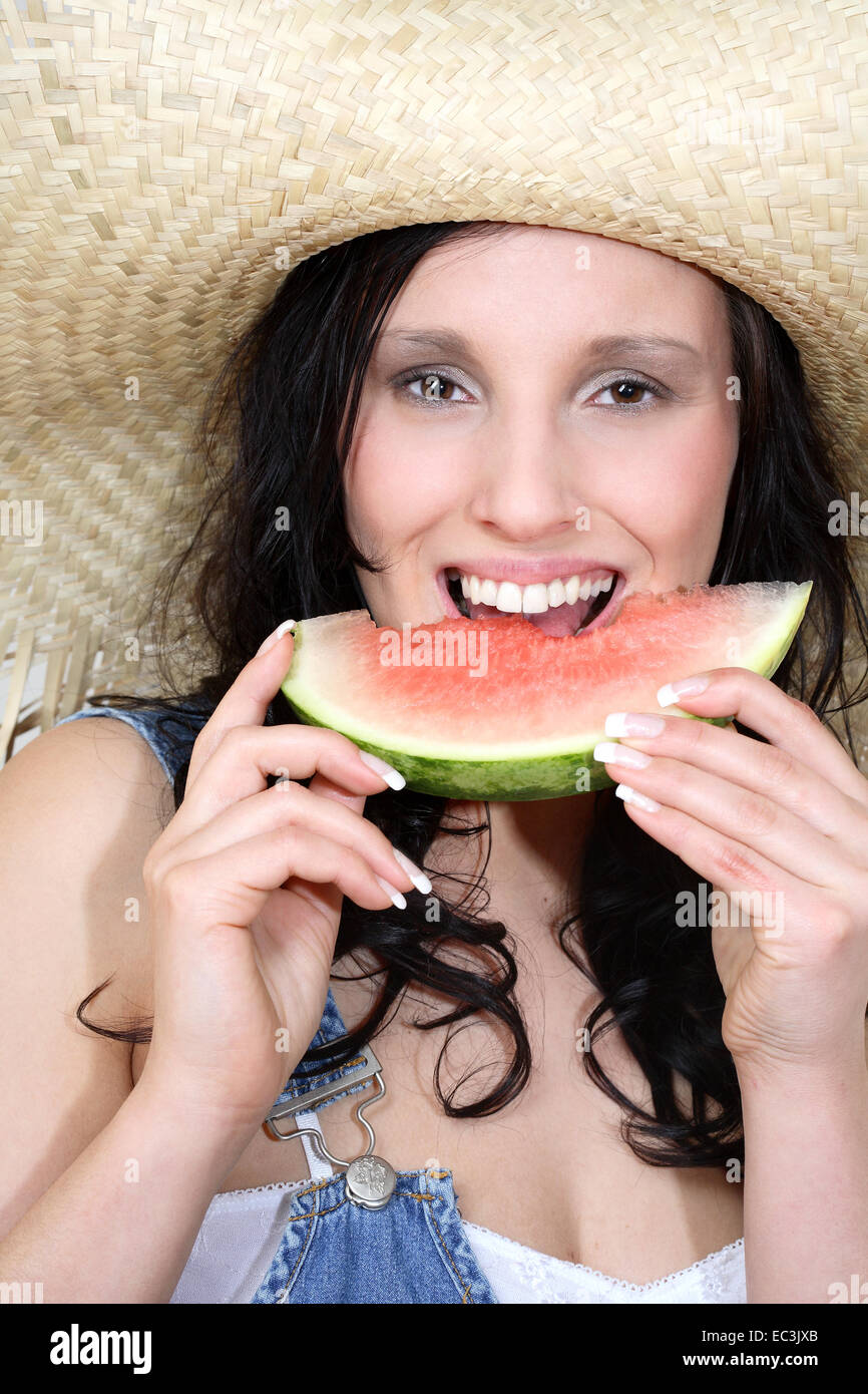 Woman eating Watermelon Stock Photo - Alamy