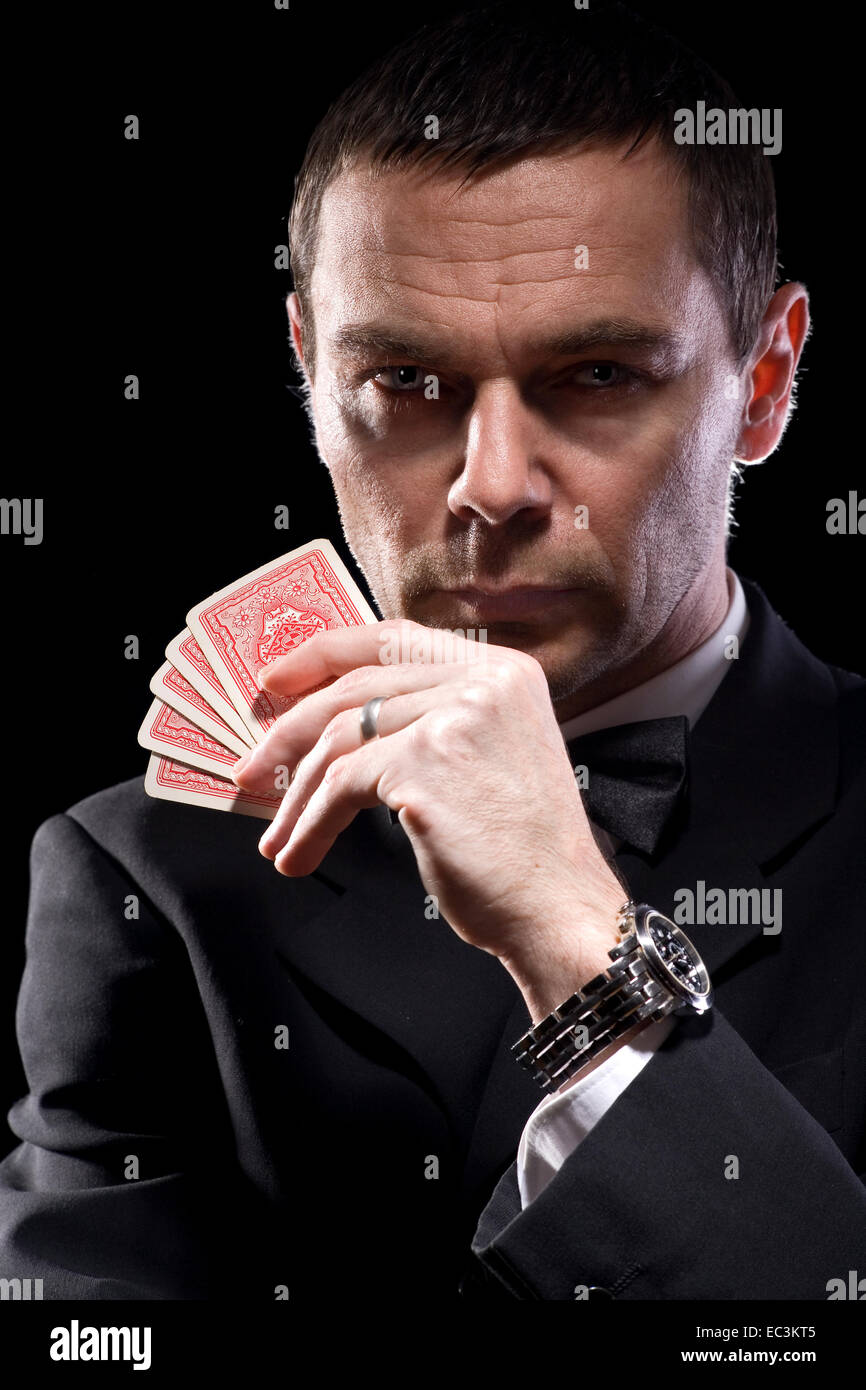 Man playing Cards Stock Photo - Alamy