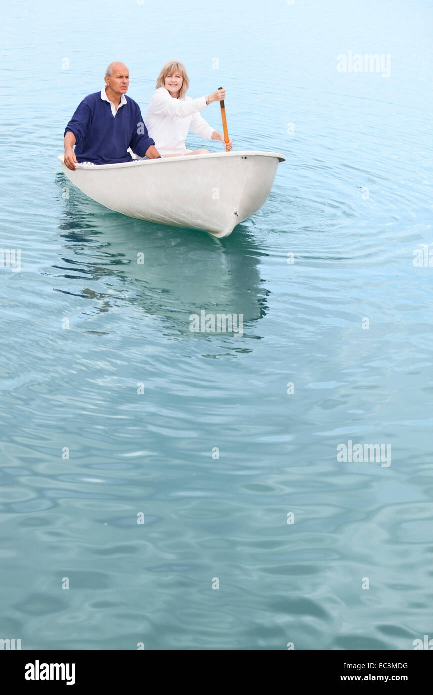 Older Couple in Rowboat Stock Photo - Alamy