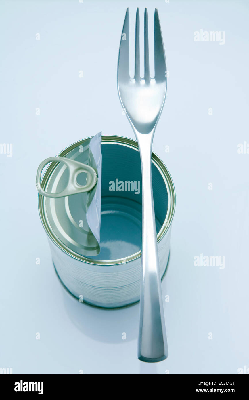 Fork and Empty Can Stock Photo - Alamy