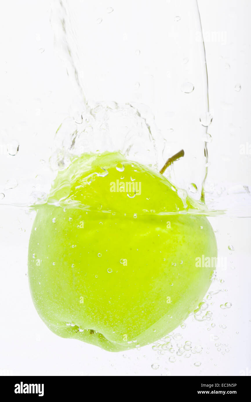 Green apple splash Stock Photo - Alamy