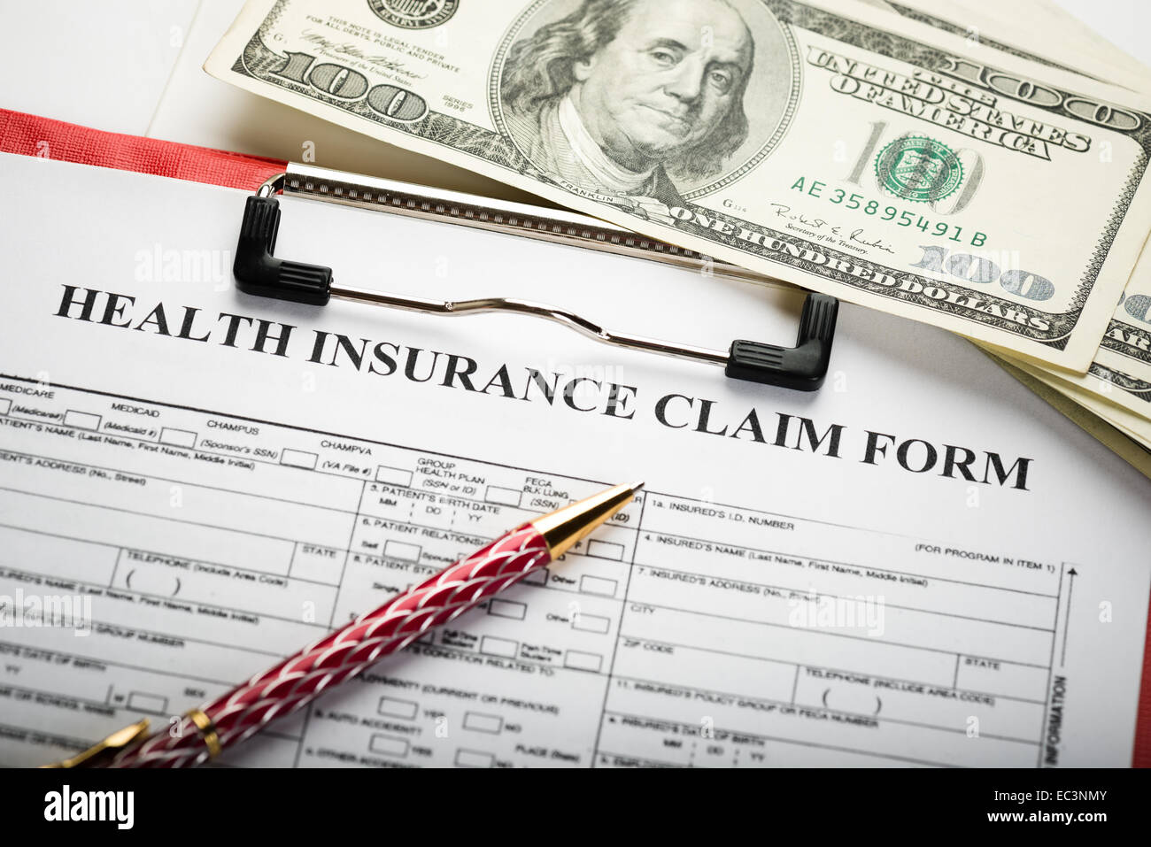 Health insurance application form with banknote and stethoscope concept ...